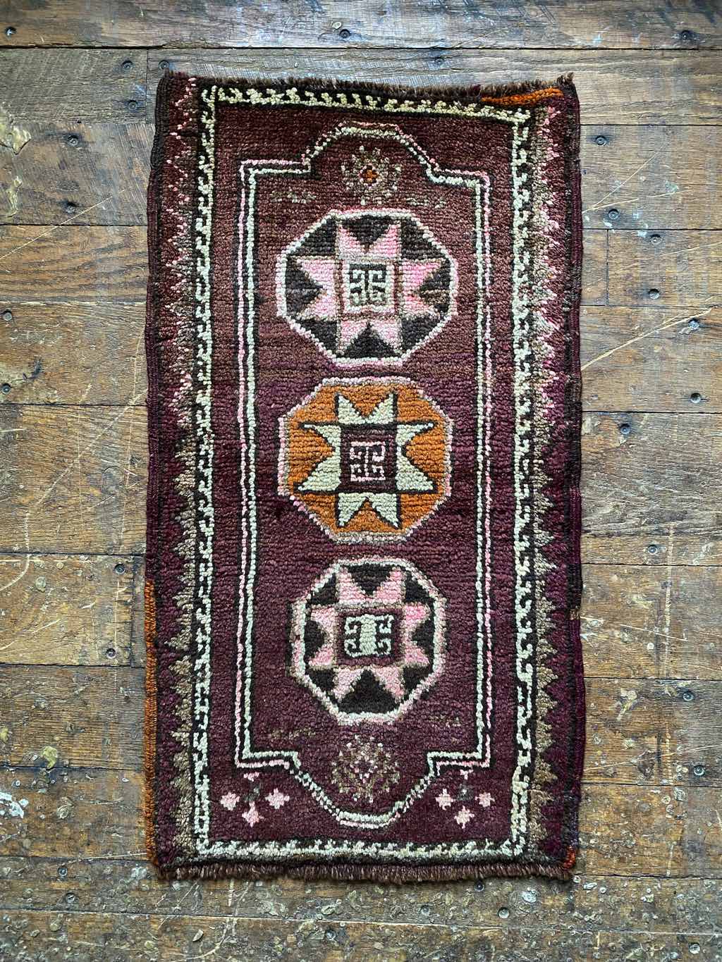 Vintage Turkish accent rug at Woven Kin Home